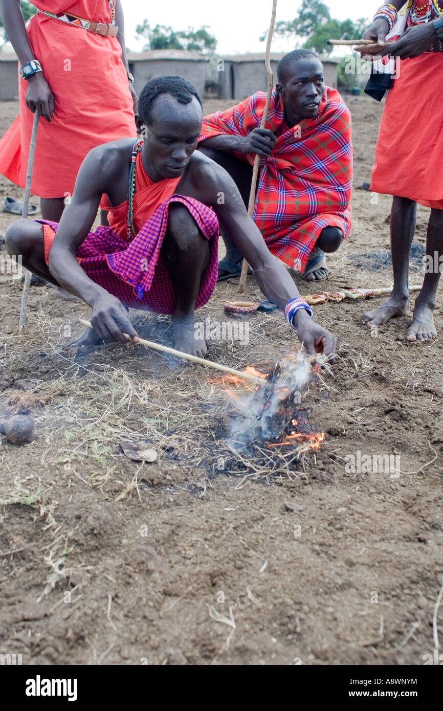 masai tribesmen demonstrating traditional method of making fire Stock ...