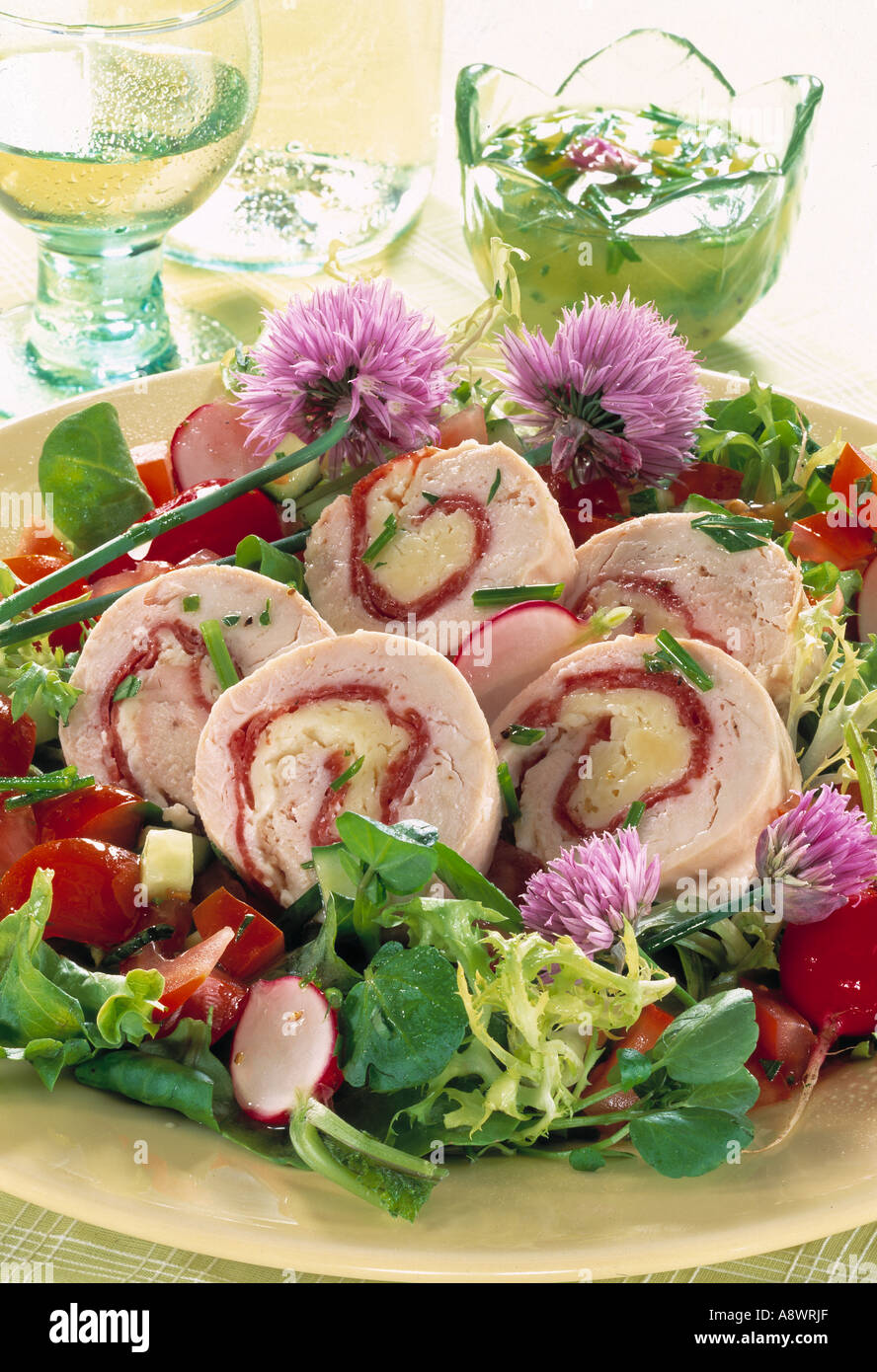 Chicken fillet roll up with parma ham & cheese with radish tomato ...