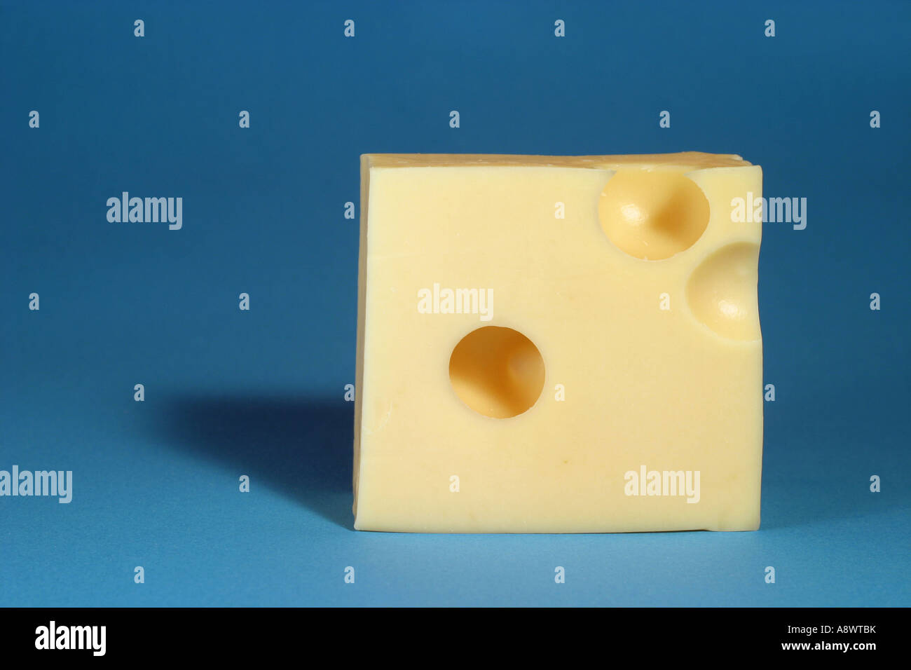 Slab of swiss cheese Stock Photo - Alamy