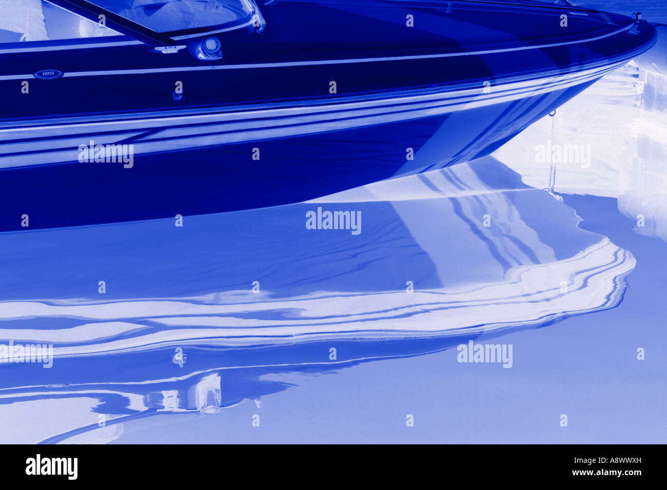 Abstract. Blue speedboat and water reflection Stock Photo - Alamy