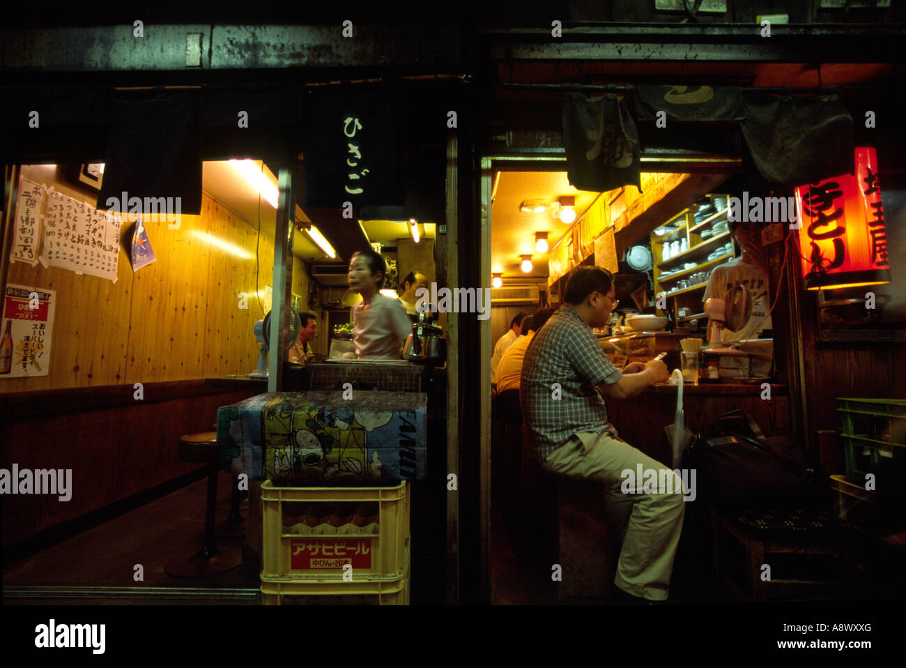 Small bars called izakaya in Omoide Yokocho (known as Piss Alley) in ...