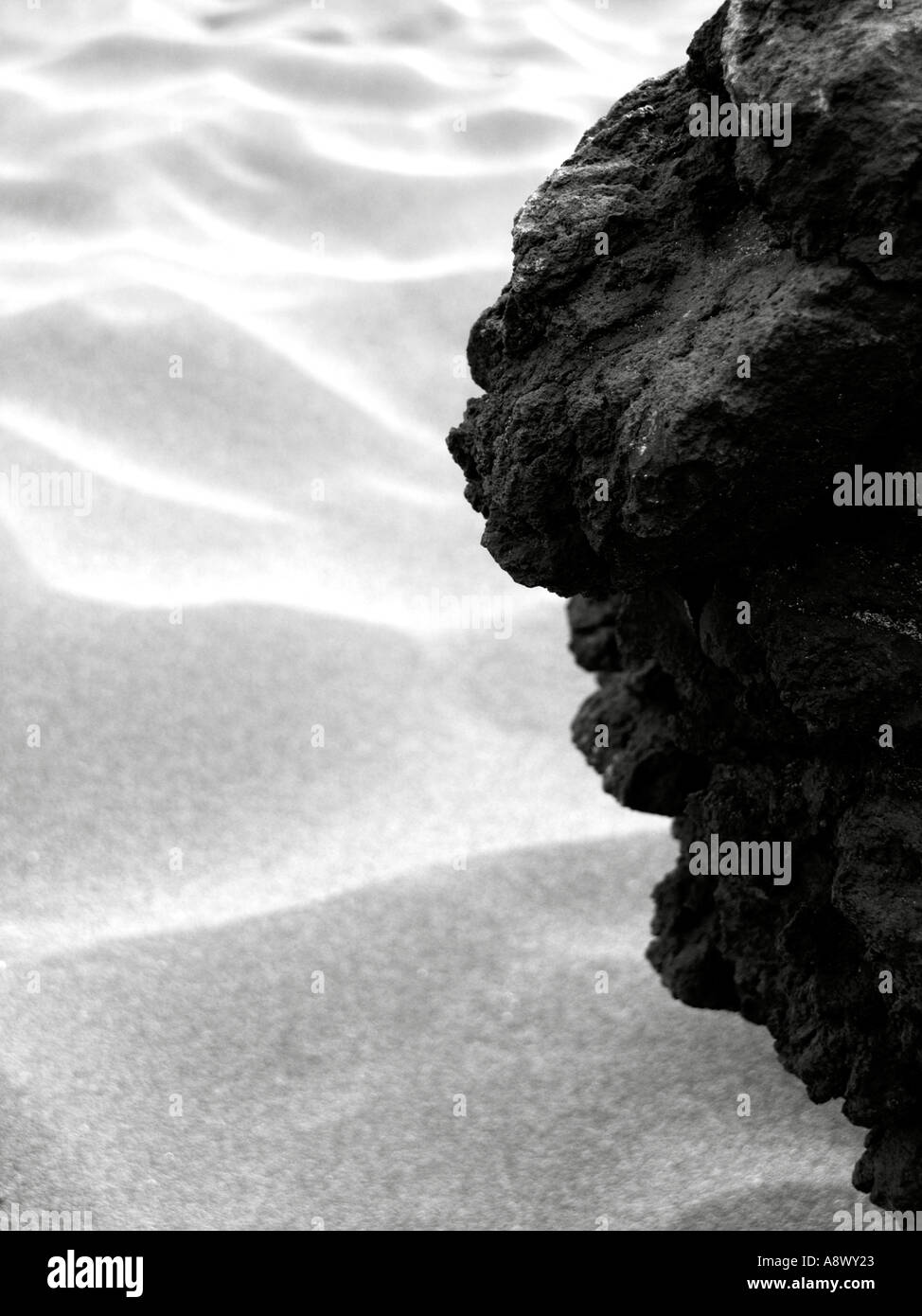 VOLCANIC ROCK AND SAND Stock Photo - Alamy