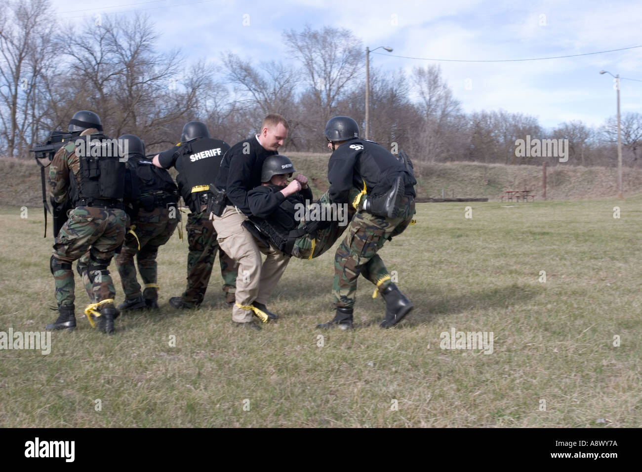 SWAT team training Retrieving injured officer from line of fire hot ...