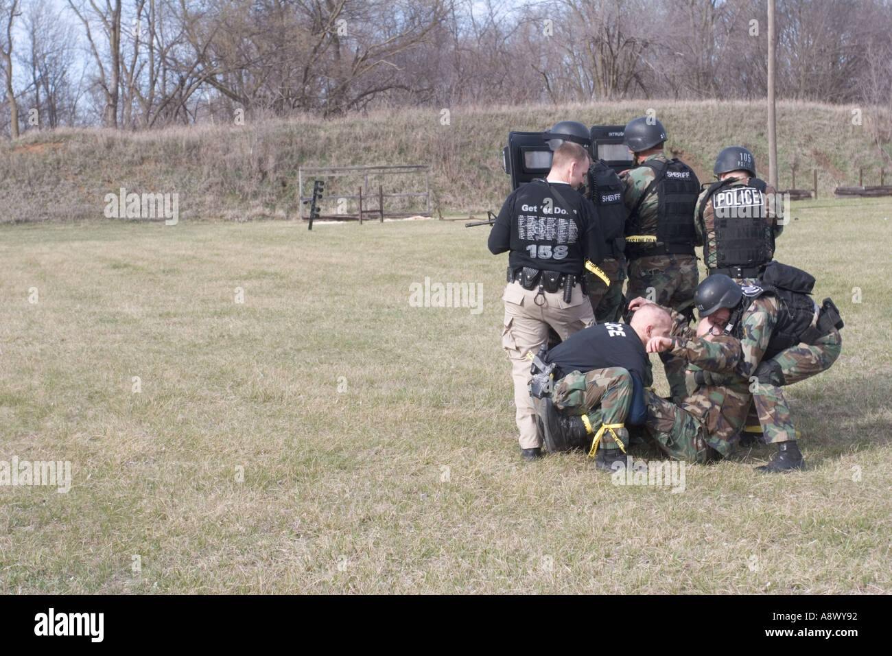 SWAT team training Retrieving injured officer from line of fire hot ...