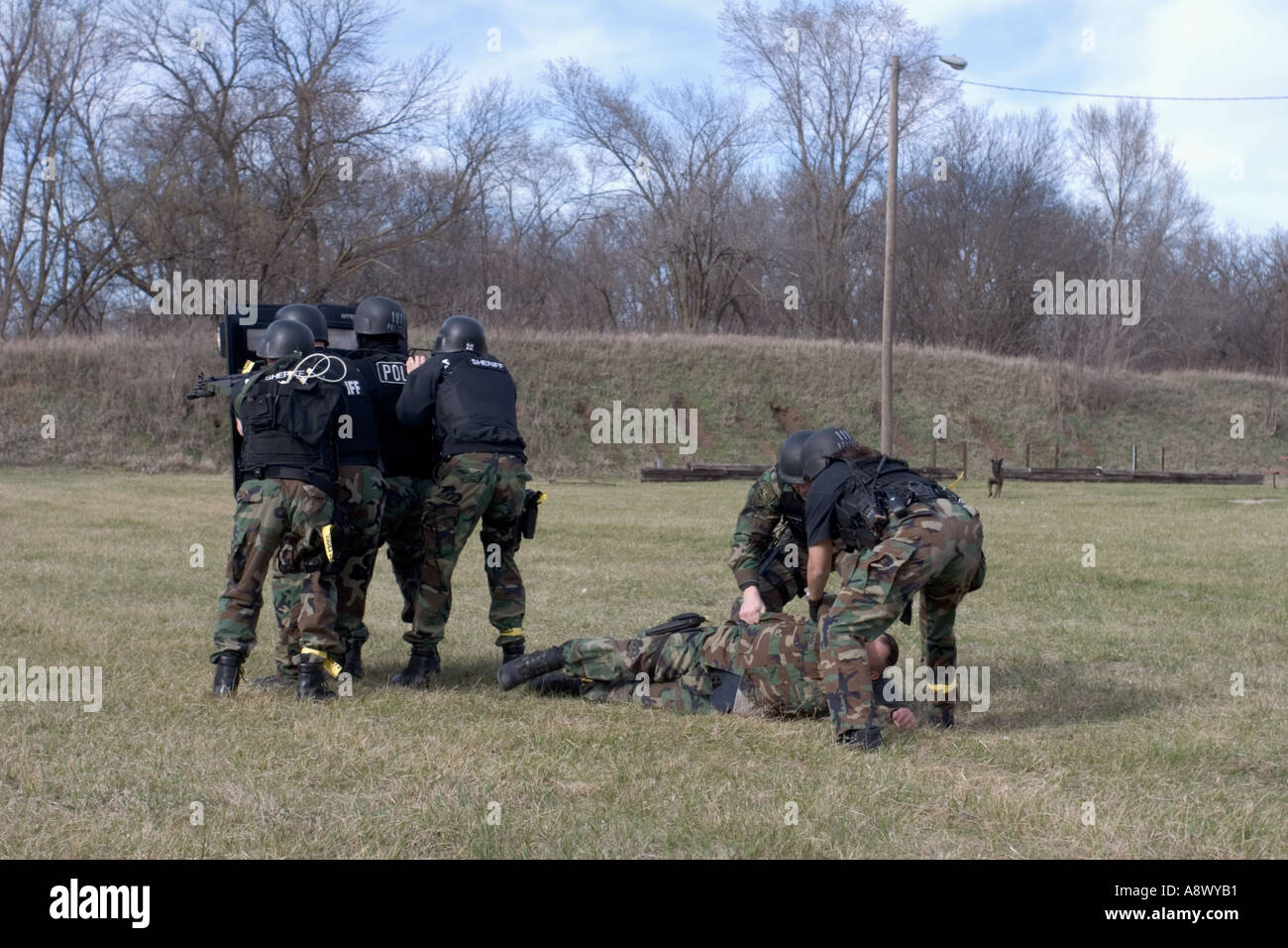 SWAT team training Retrieving injured officer from line of fire hot ...