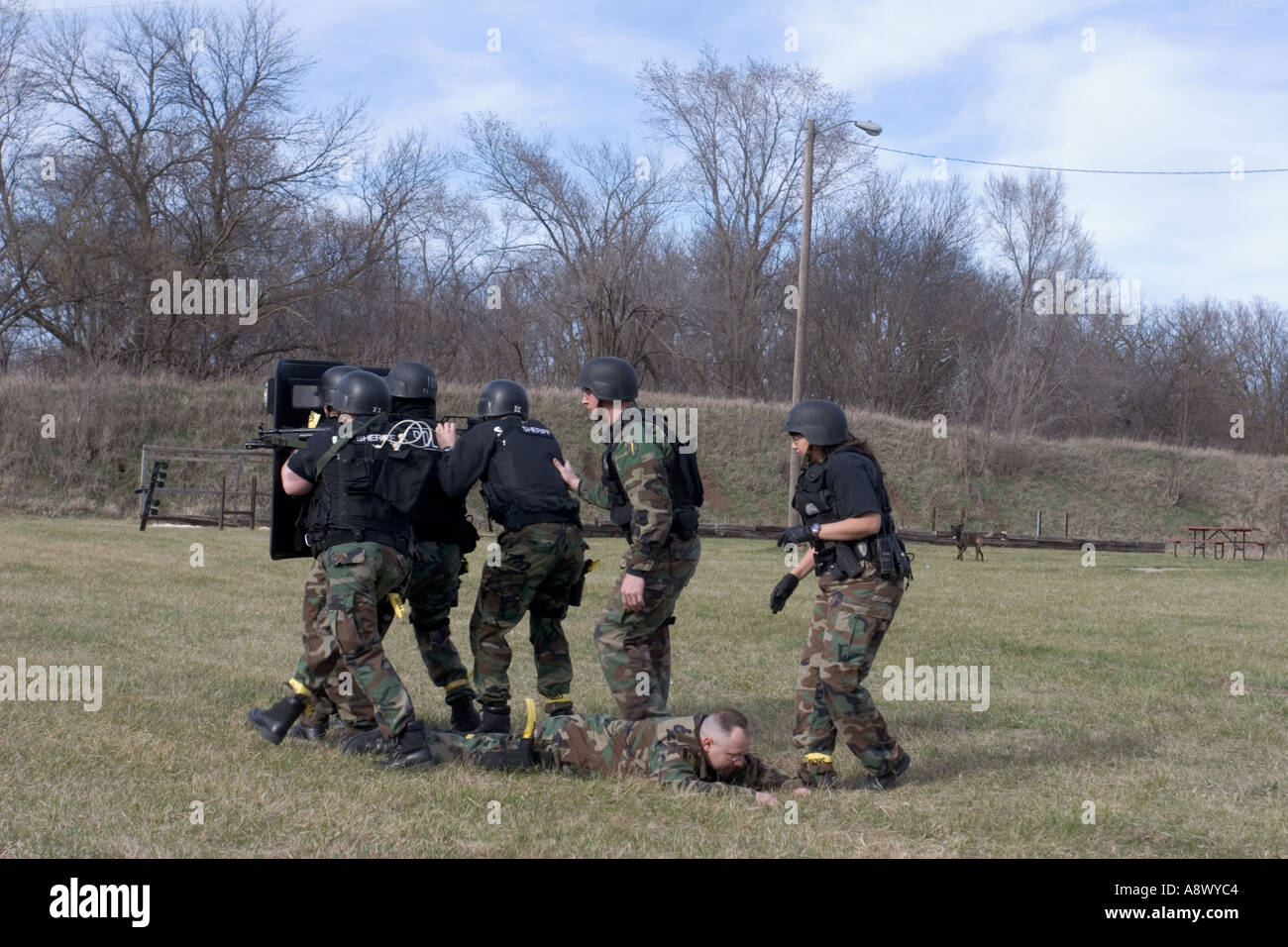 SWAT team training Retrieving injured officer from line of fire hot ...