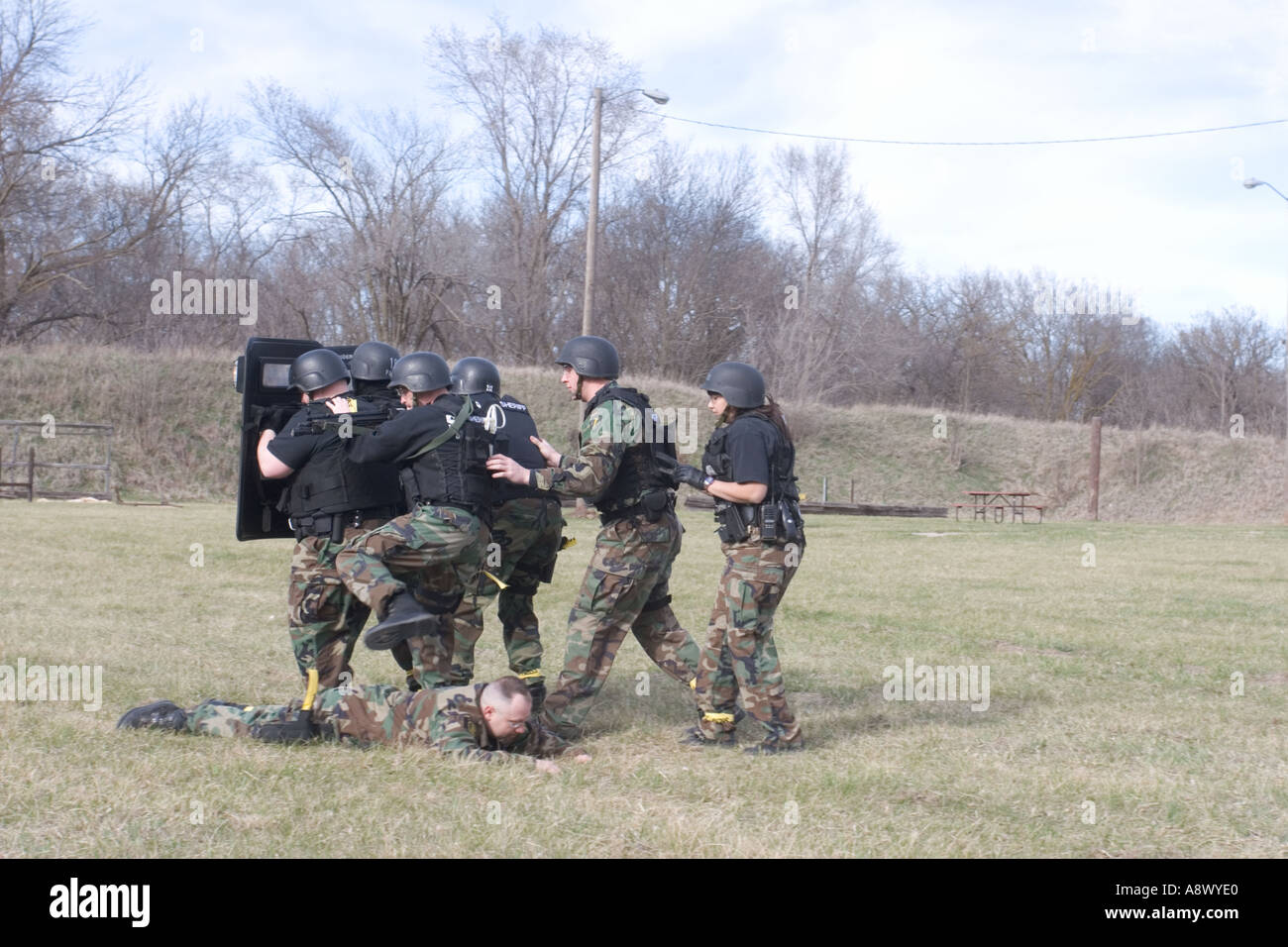 SWAT team training Retrieving injured officer from line of fire hot ...