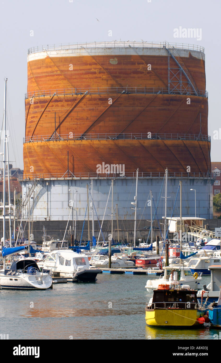 Gasometer that dominates the marina at Weymouth Dorset Southern England ...