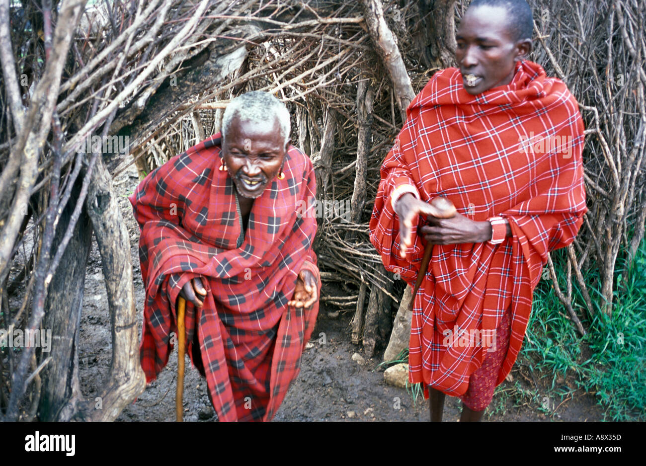 KENYA Masai Mara National Reserve Chief and his son outside the thorn ...