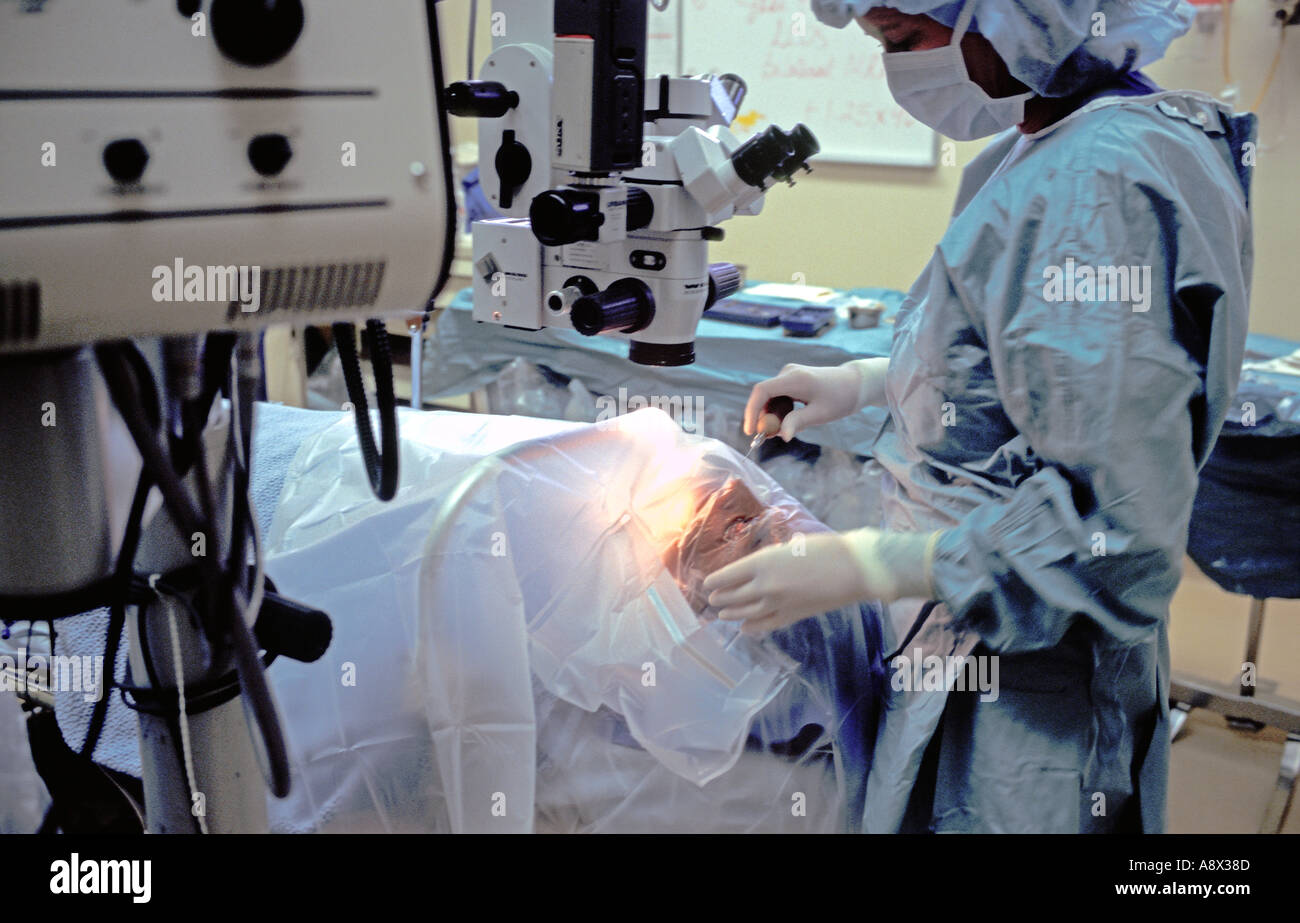 Surgical nurse prepares patient for cataract surgery with electronic ...