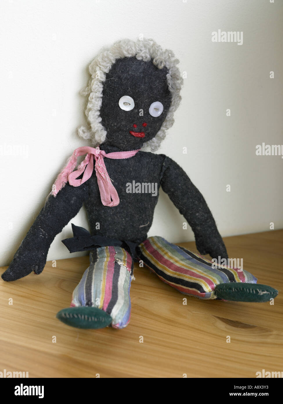 homemade old rag gollywog doll sitting on a shelf Stock Photo - Alamy