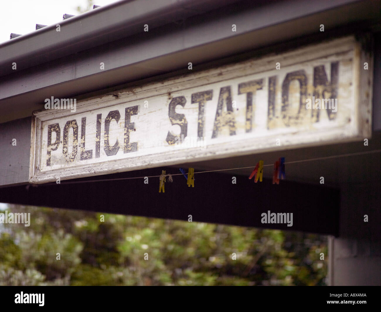 weathered police station sign Stock Photo - Alamy