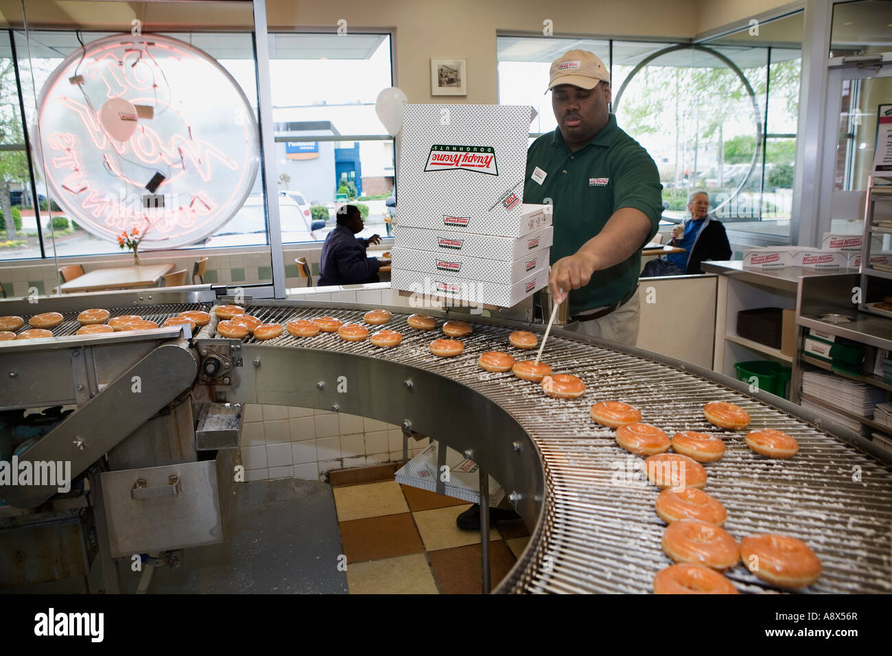 Making donuts at the original Krispy Kreme Winston Salem North Carolina ...