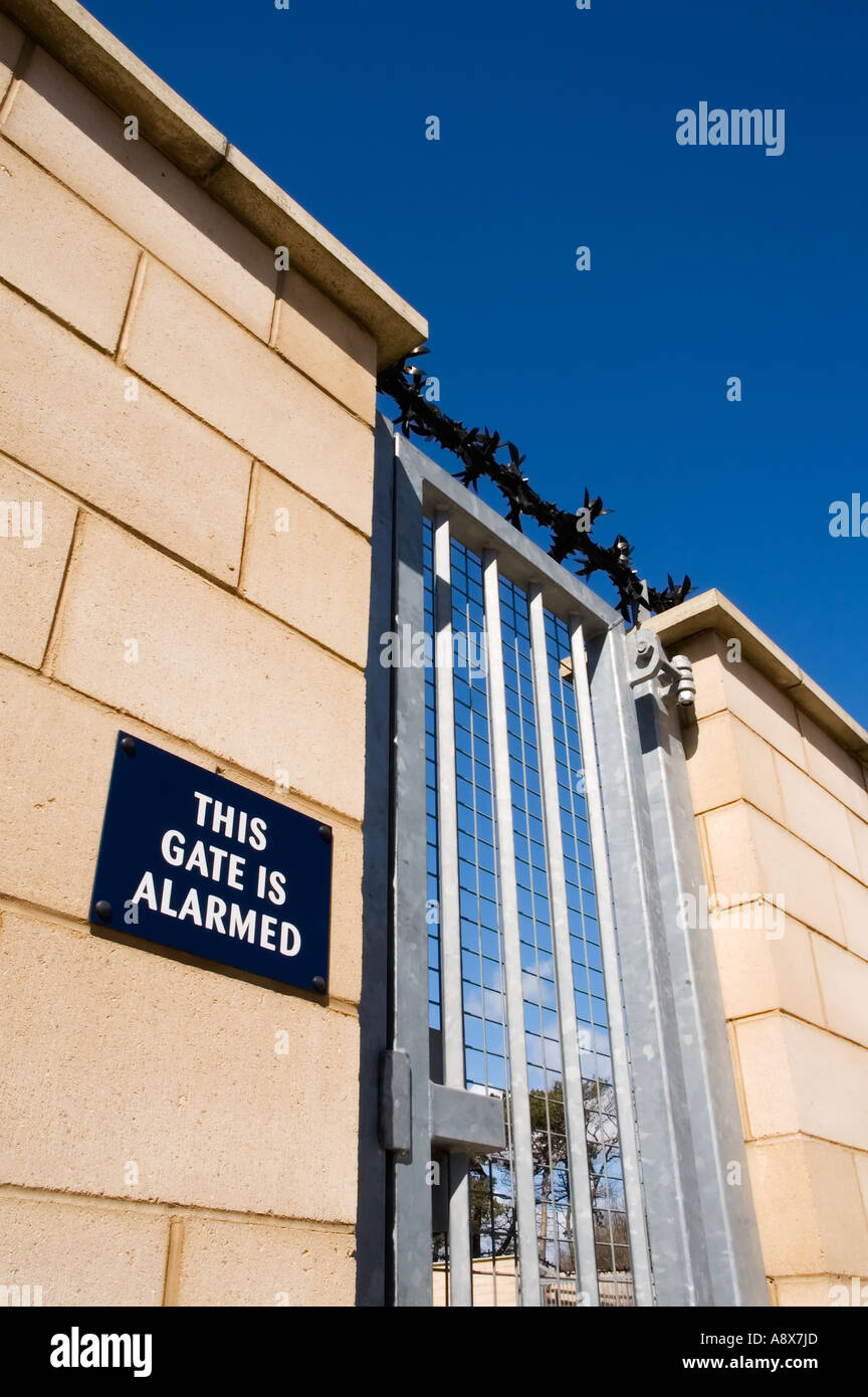 Locked gate with danger sign hi-res stock photography and images - Alamy