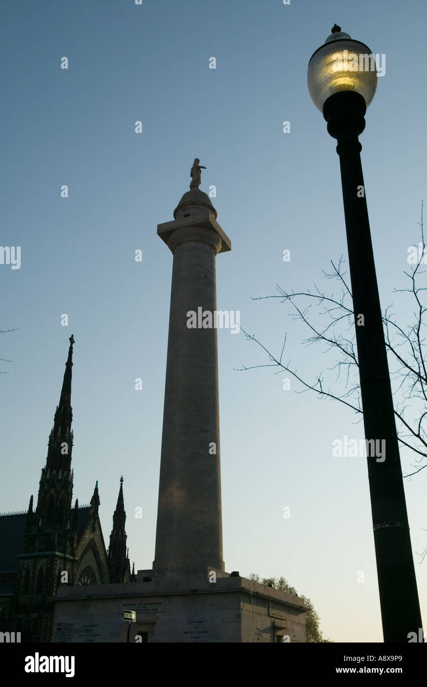 Washington Monument of Baltimore Maryland with spires of Mount Vernon ...