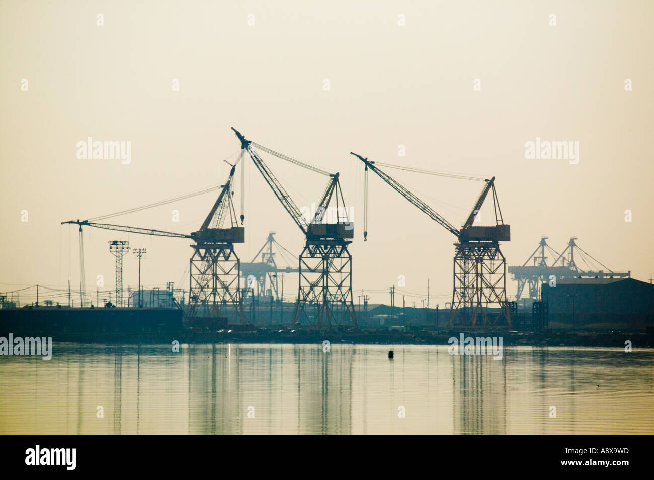 Giant cranes tower over Baltimore harbor in Maryland Stock Photo - Alamy