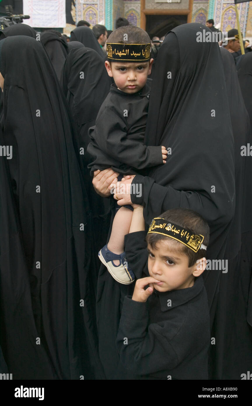Women and children during a procession in Karbala Iraq on Ashura s eve ...