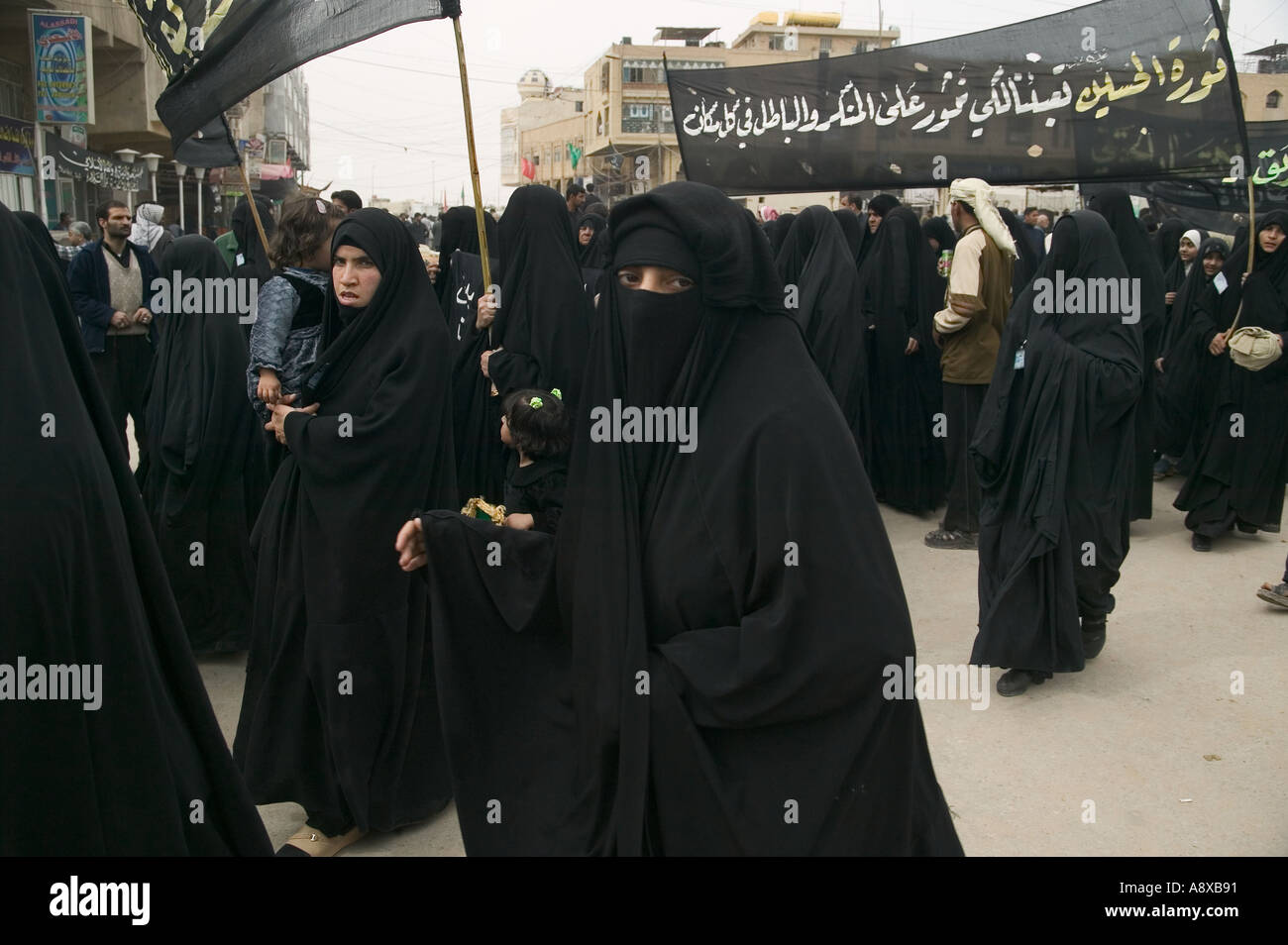 Women and children during a procession in Karbala Iraq on Ashura s eve ...