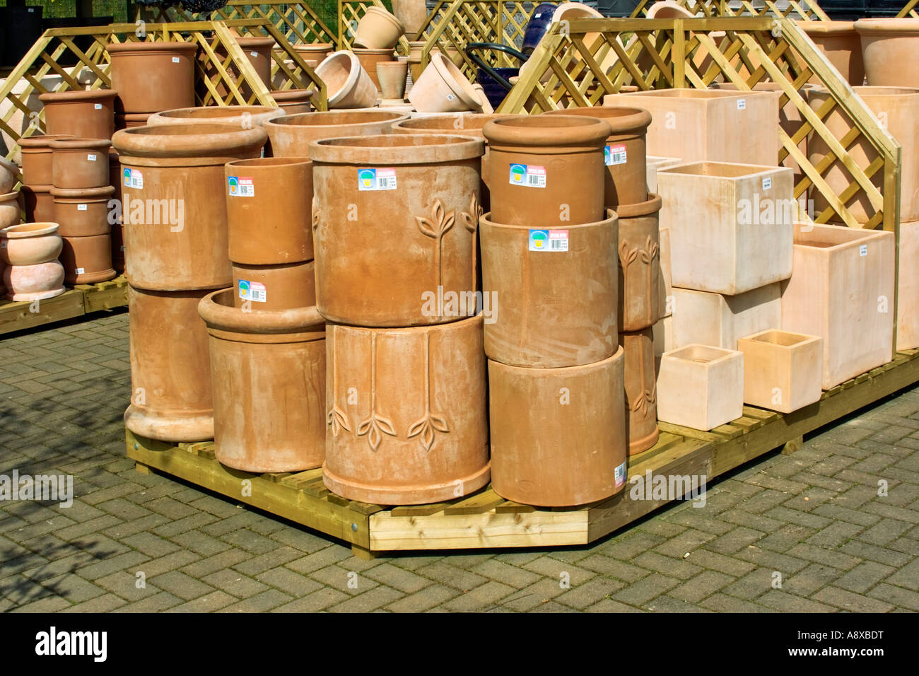 terracotta pots stacked up in garden centre ready for sale Stock Photo ...