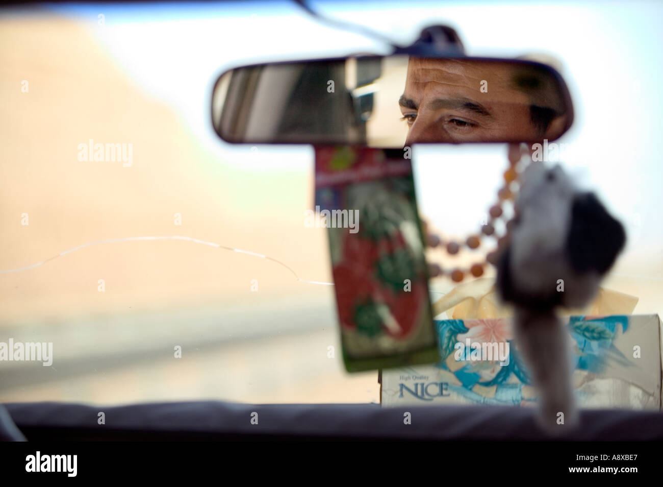 Inside a taxi crossing the desert in West Iraq 28 02 04 Stock Photo - Alamy