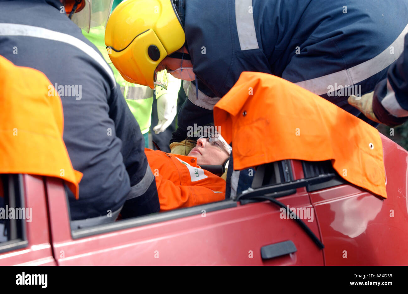 Firefighters cut open a car during a training drill Stock Photo - Alamy
