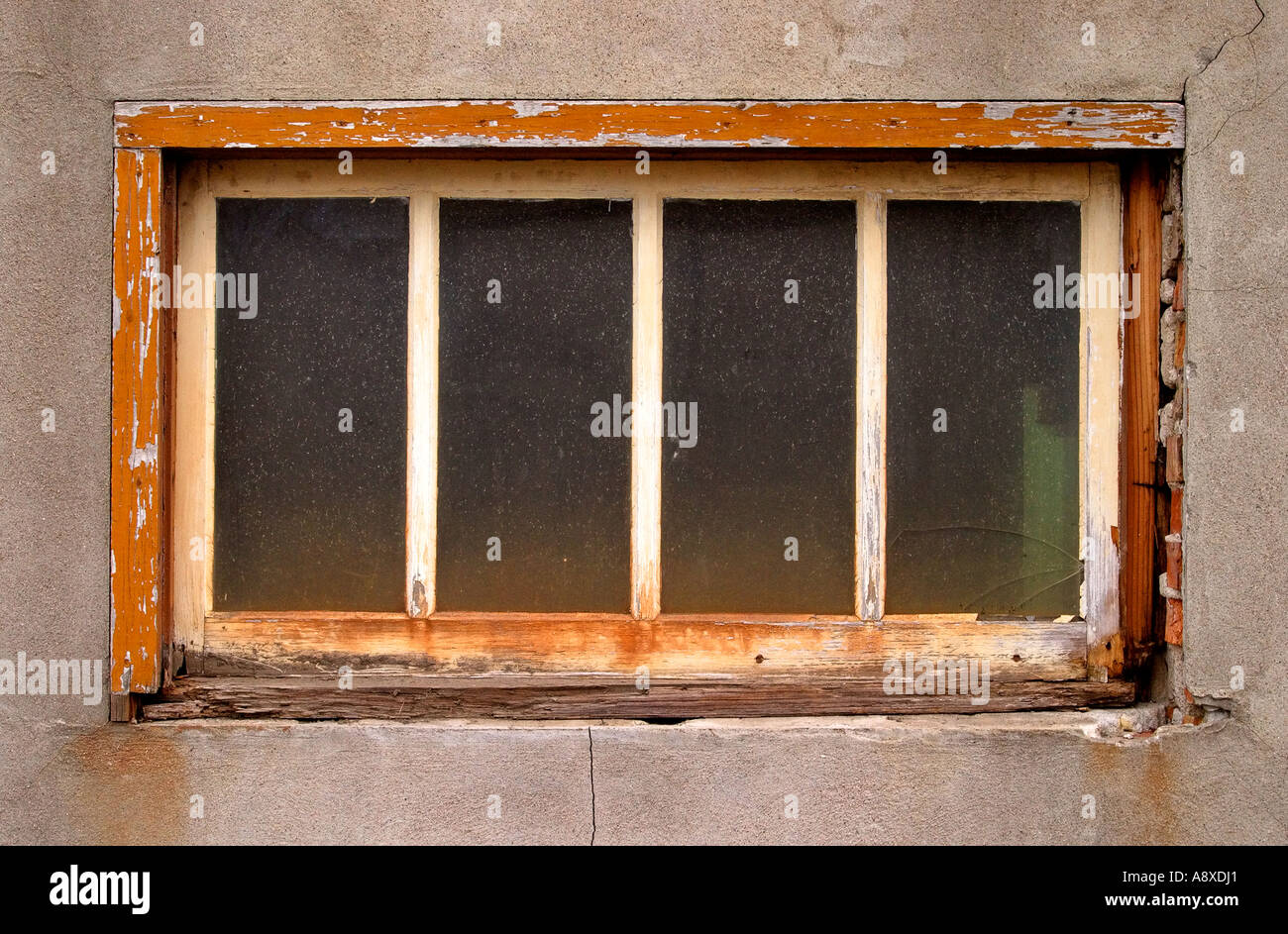 Basement window of old house in Moose Jaw in scenic Saskatchewan Canada ...
