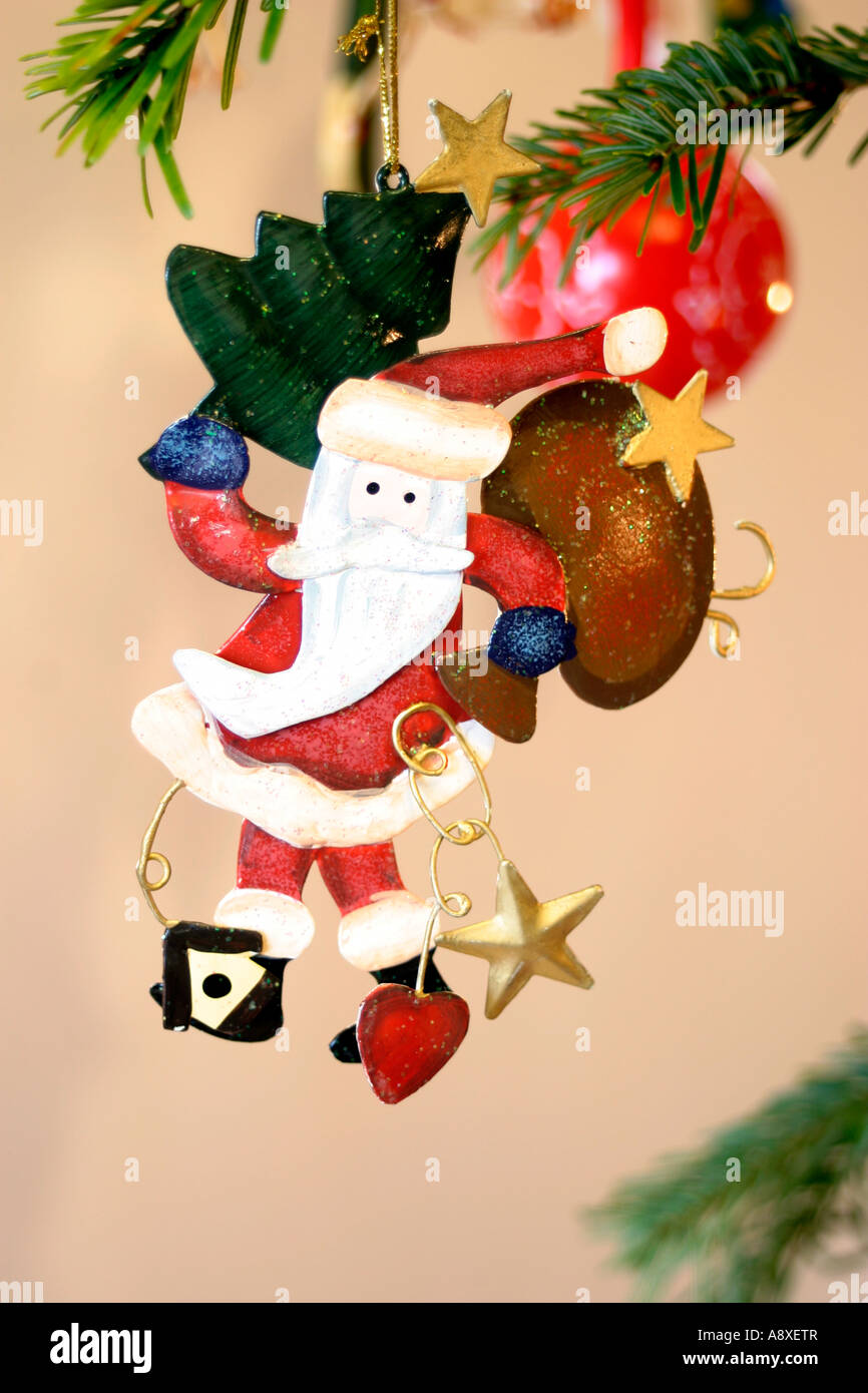 Father Christmas decoration on a Christmas tree Stock Photo - Alamy