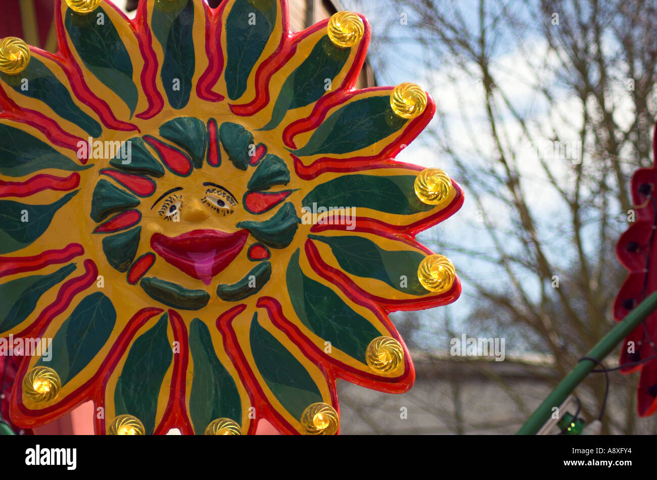 Bright painted sun face Stock Photo - Alamy