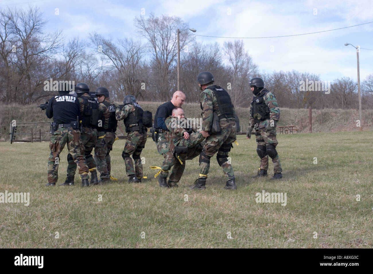 SWAT team training Retrieving injured officer from line of fire hot ...