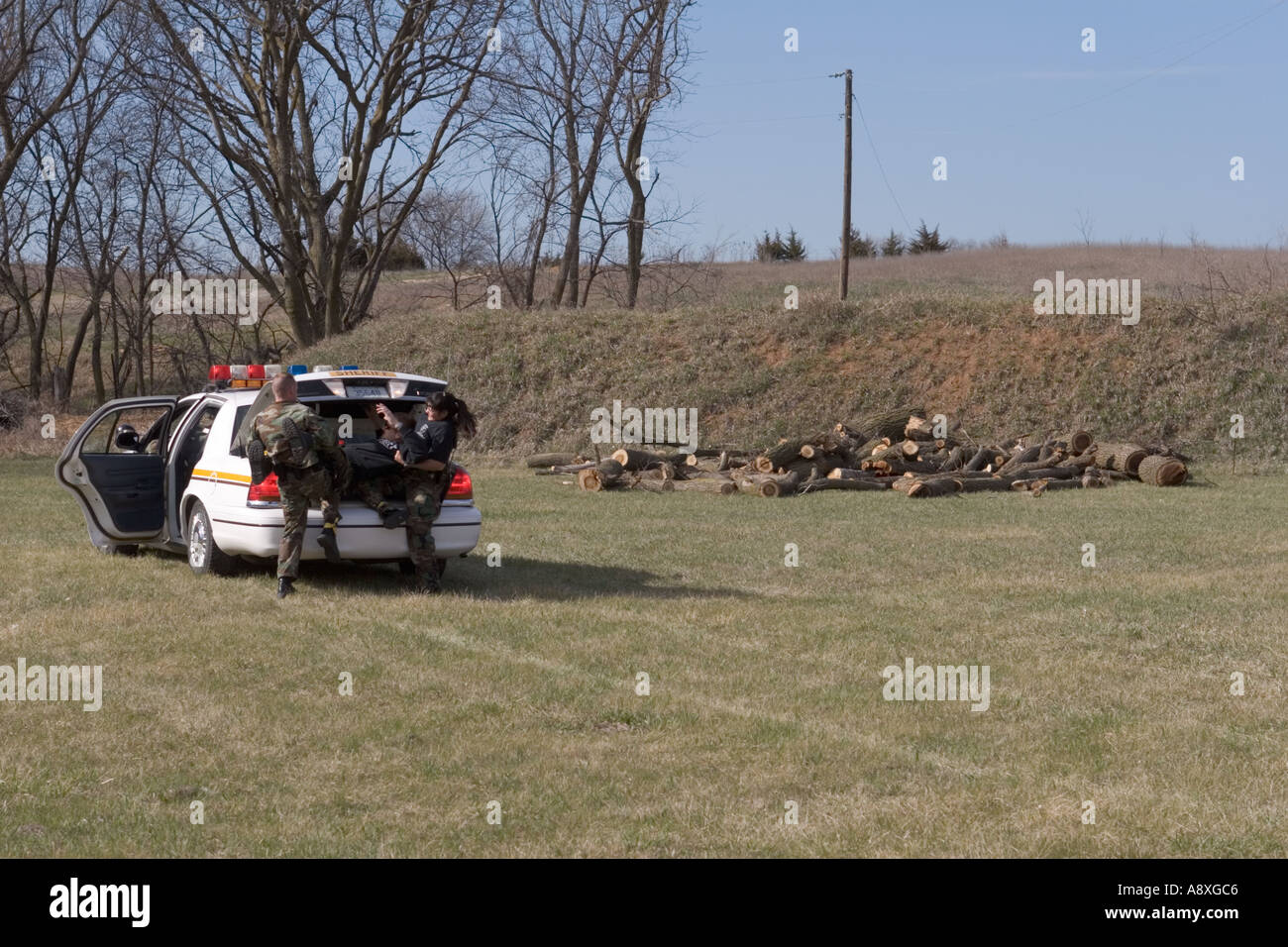 SWAT team training Retreiving injured officer from line of fire hot ...