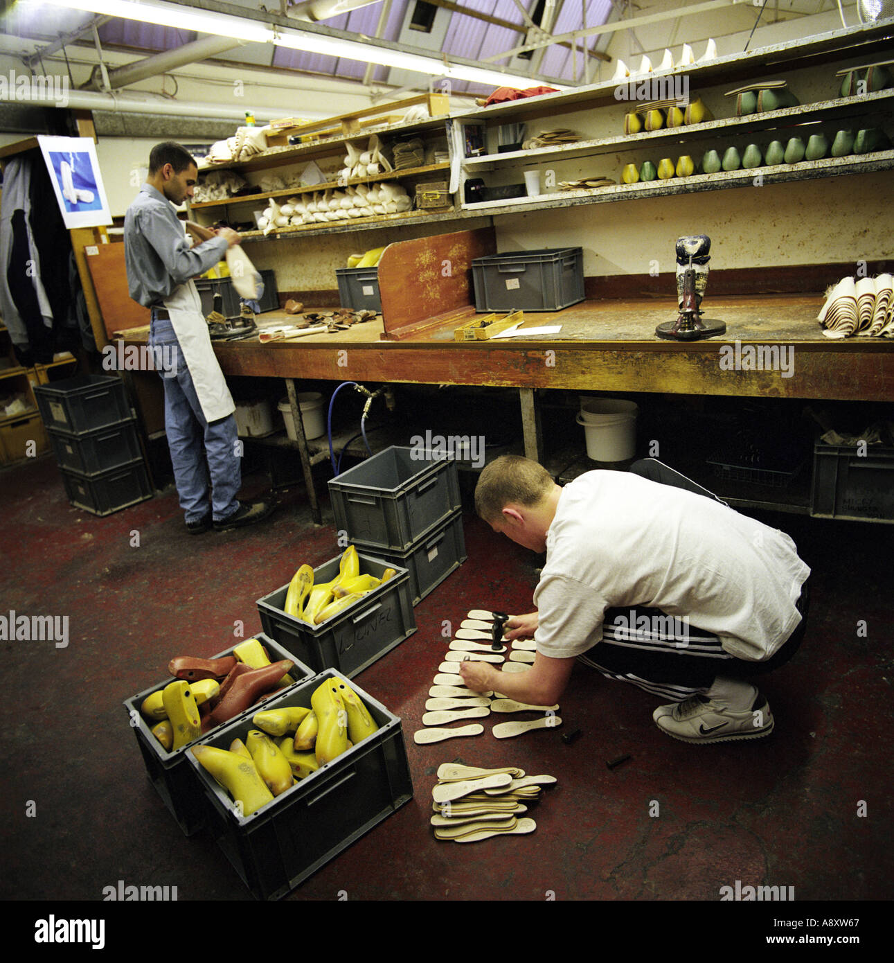A ballet shoe maker in the freed factory London Stock Photo - Alamy