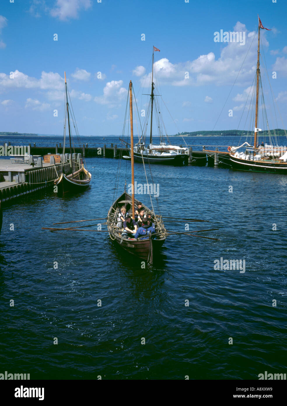 Replica Viking longship leaving harbour, Roskilde, Sjælland (Zealand ...