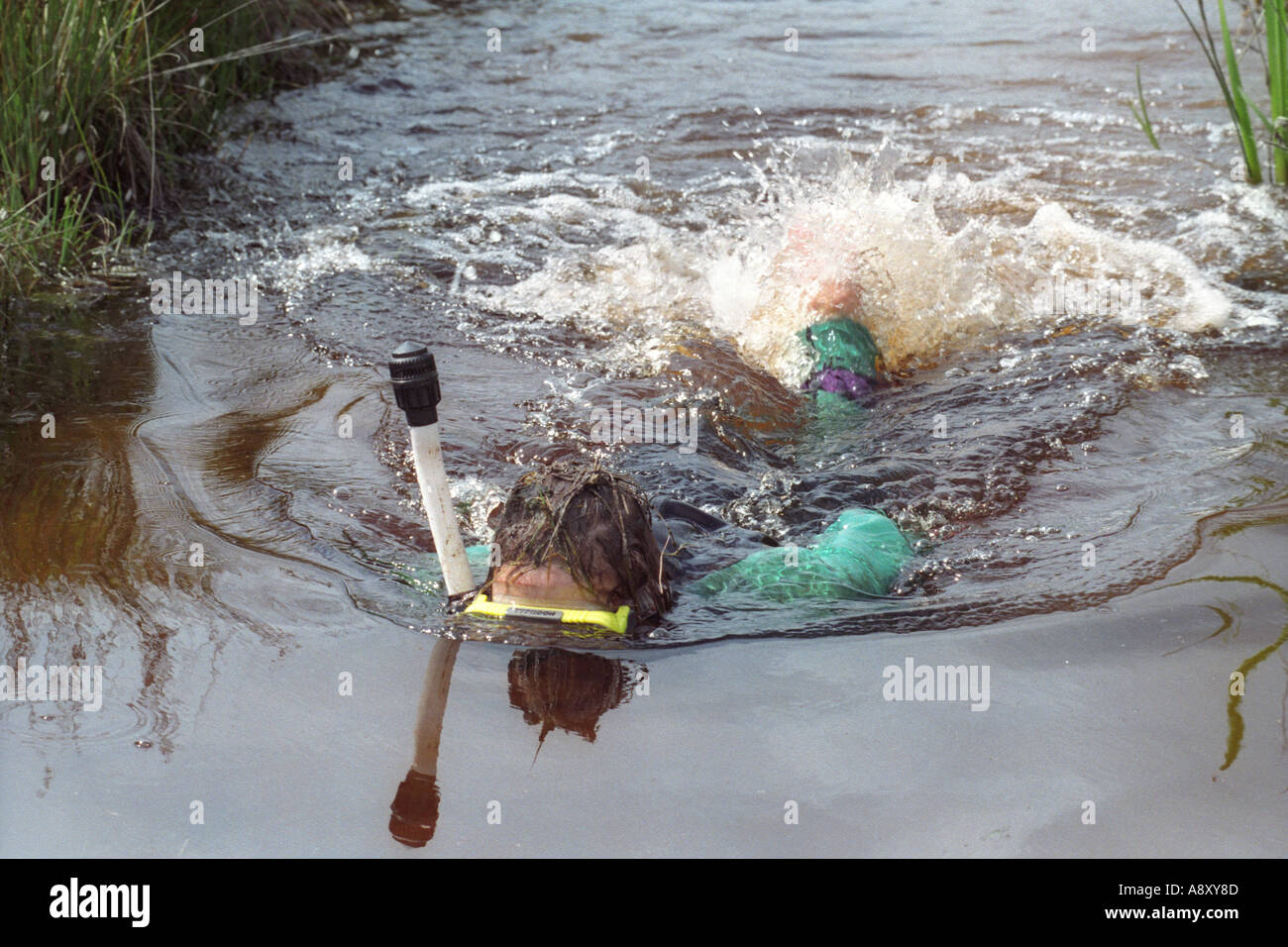 Competitor in the annual World Bog Snorkelling Championships at ...