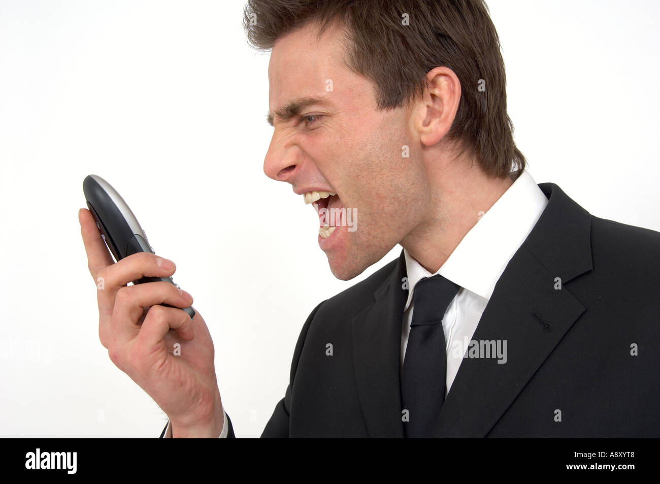 man yelling down the telephone Stock Photo - Alamy