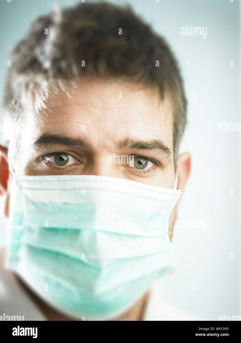 close up of health worker wearing mask to stop the spread of infection ...