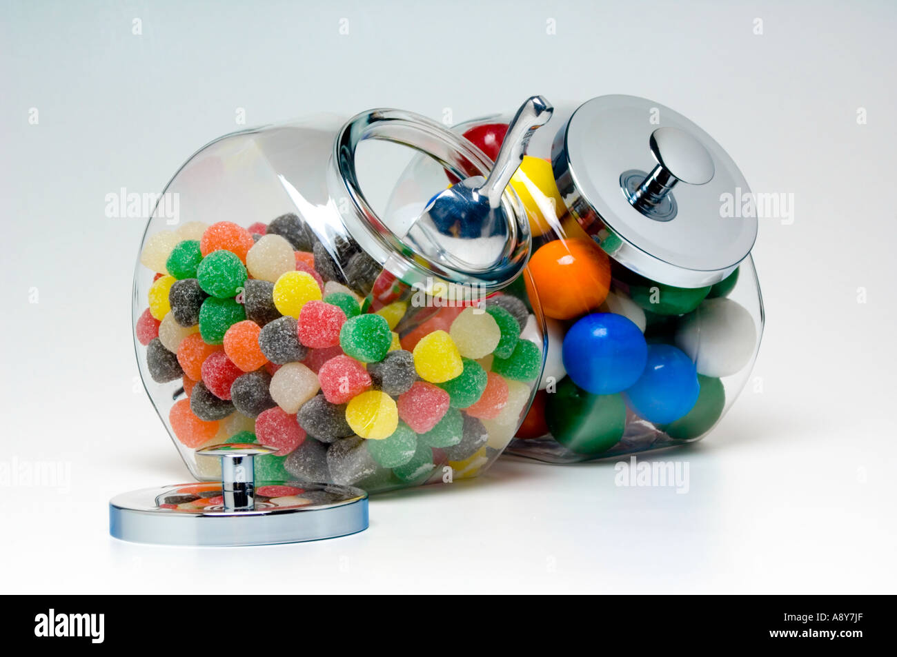 Glass containers colorful candies hi-res stock photography and images ...