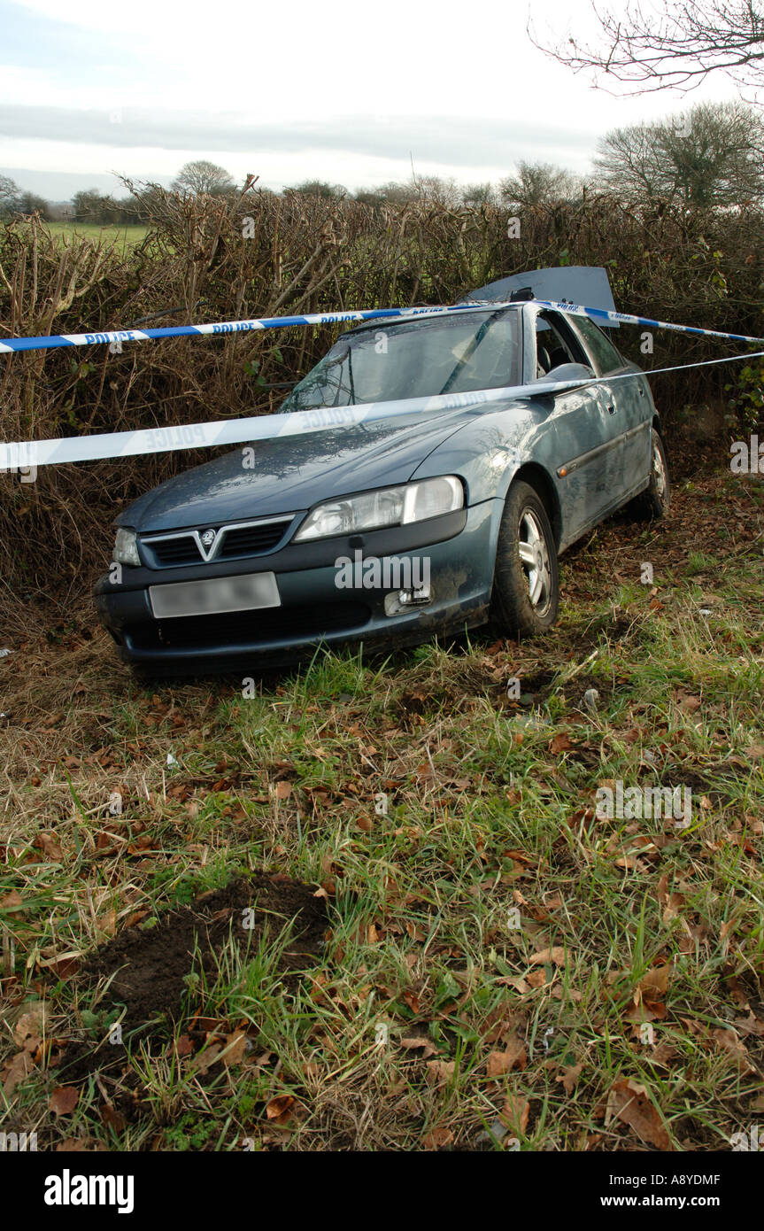 Car in roadside ditch after accident Stock Photo - Alamy