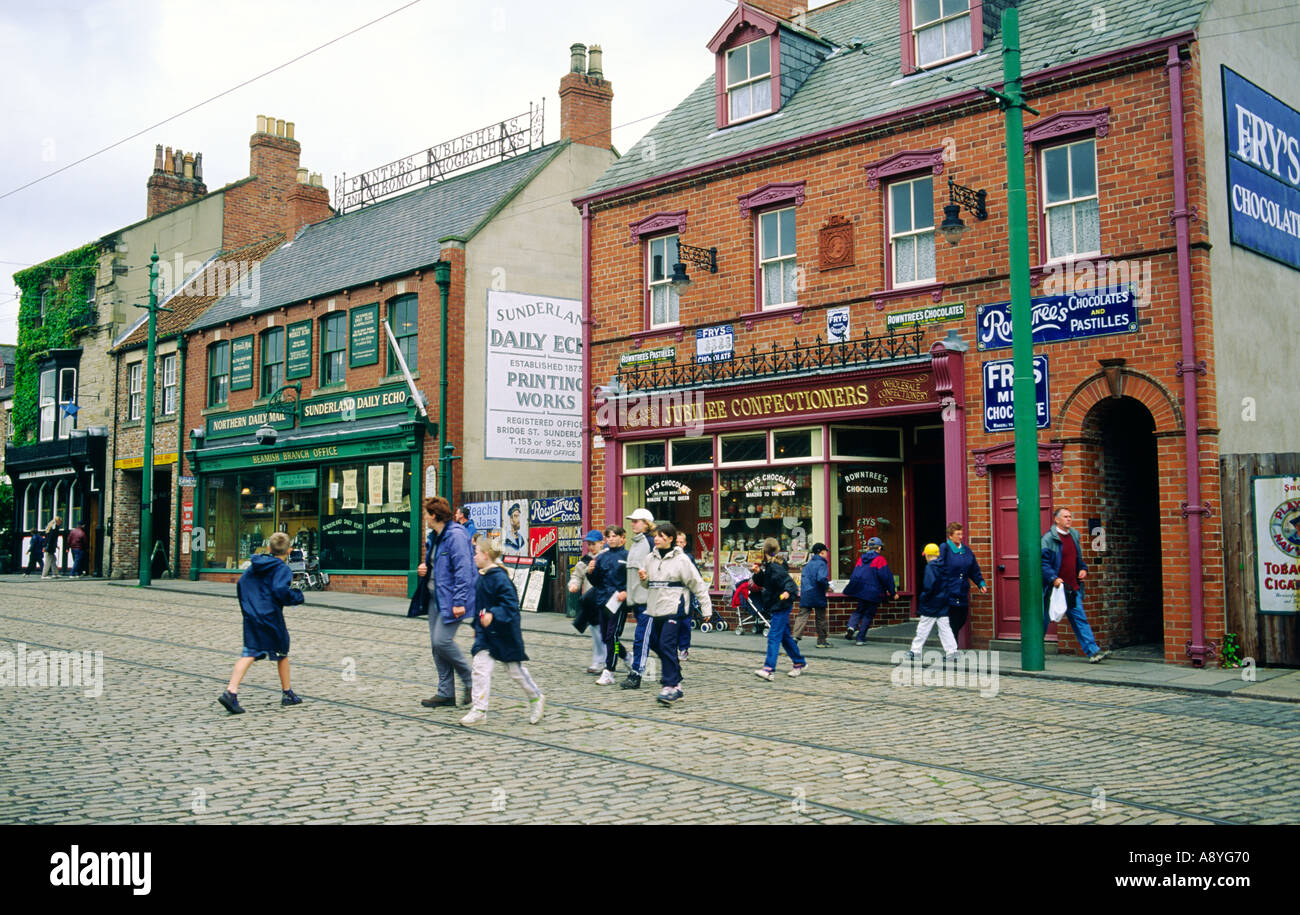 Beamish Museum, County Durham, England. Visitors in 1913 town street ...
