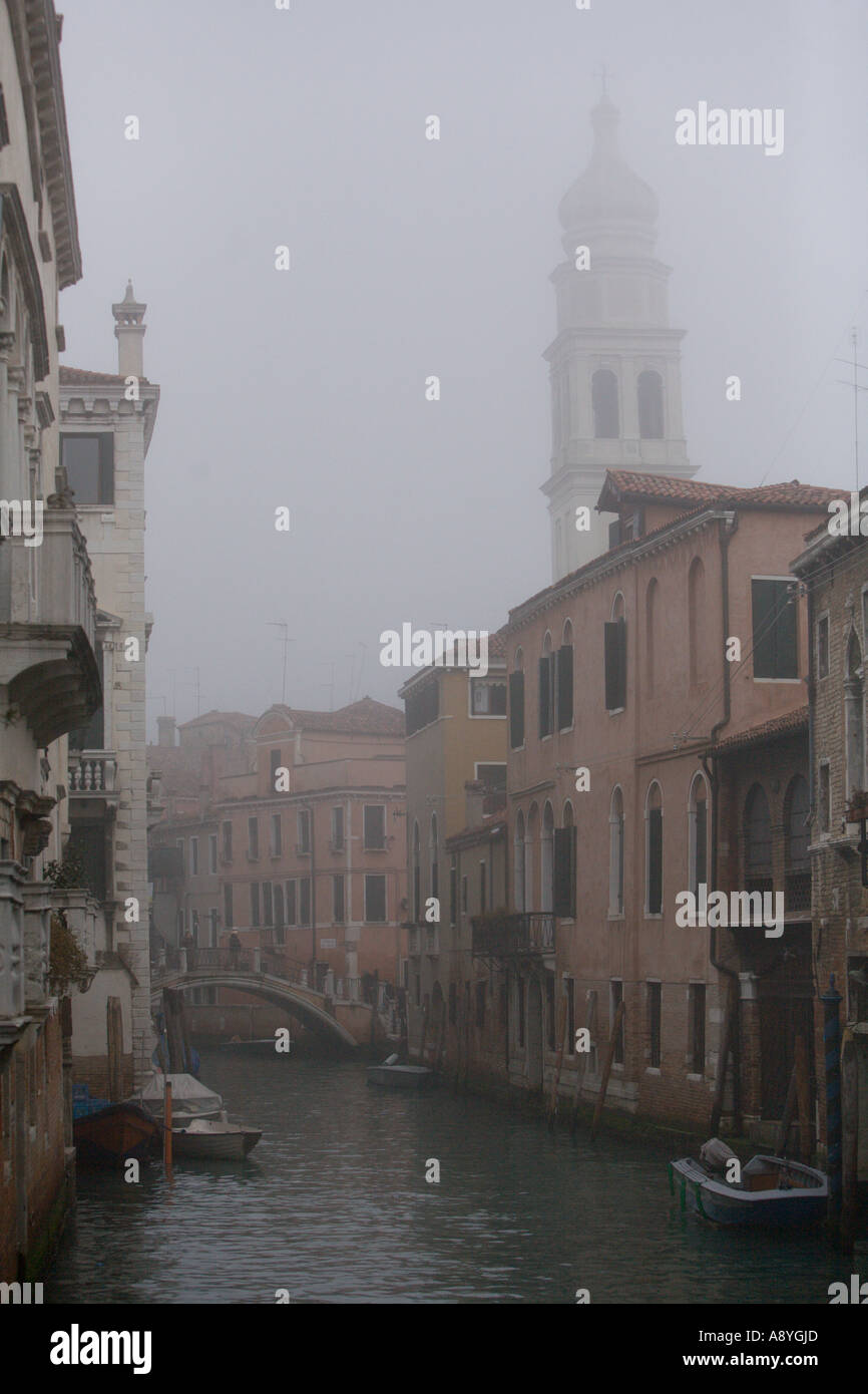 venice canal in the fog Stock Photo - Alamy