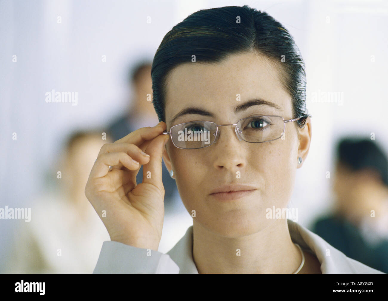 Young businesswoman wearing glasses Stock Photo - Alamy