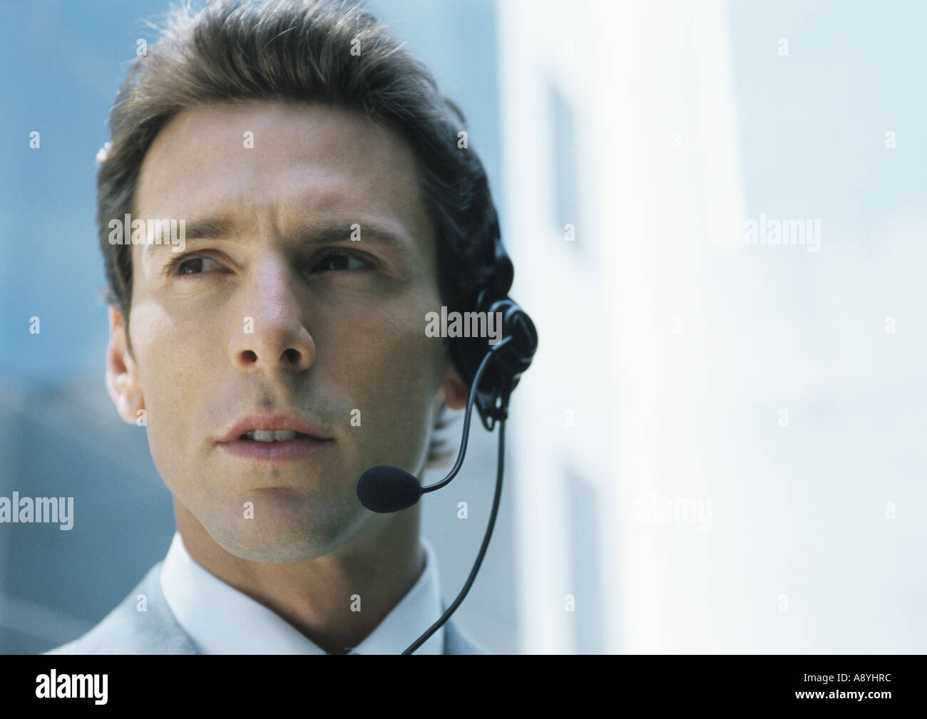 Man wearing headset Stock Photo - Alamy
