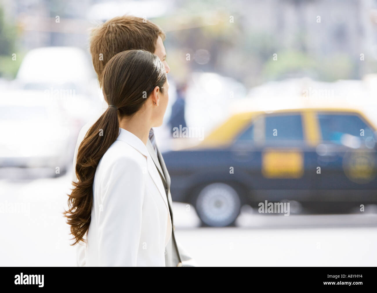 Two business associates in street Stock Photo - Alamy