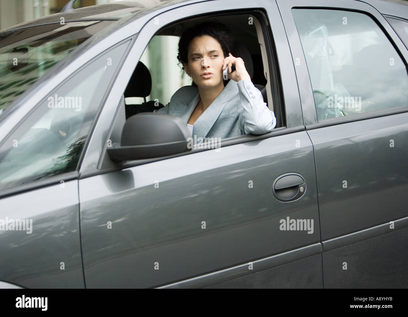 Mobile phones in vehicles hi-res stock photography and images - Alamy