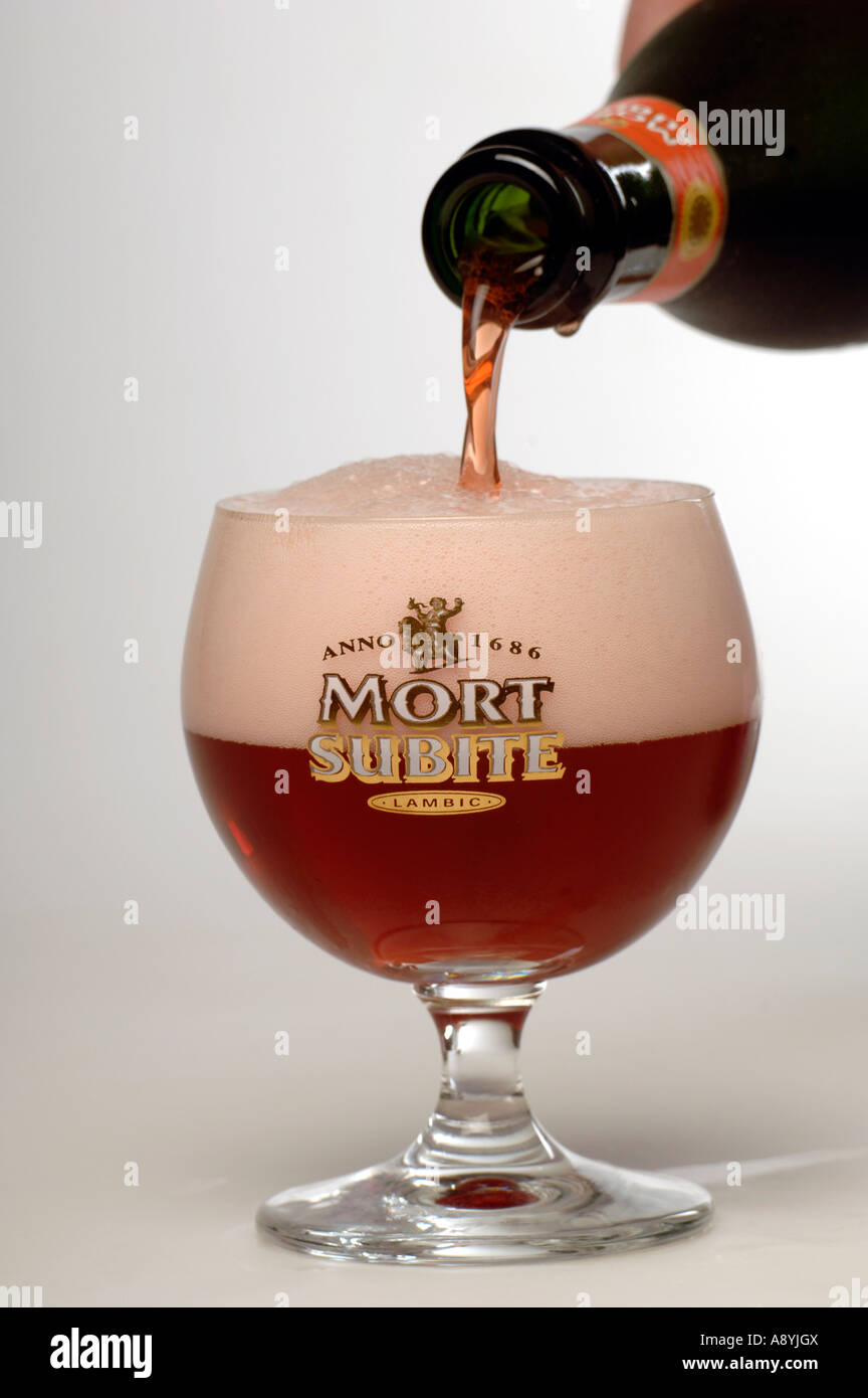 Pouring Mort Subite kriek beer into a balloon glass Stock Photo - Alamy