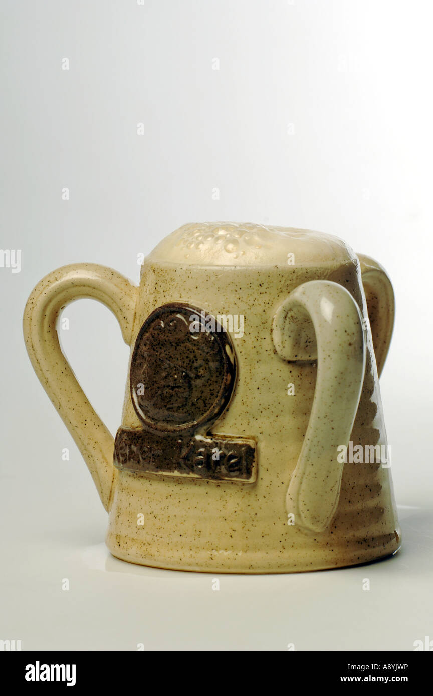 Triple handled mug of Belgian Beer Stock Photo - Alamy