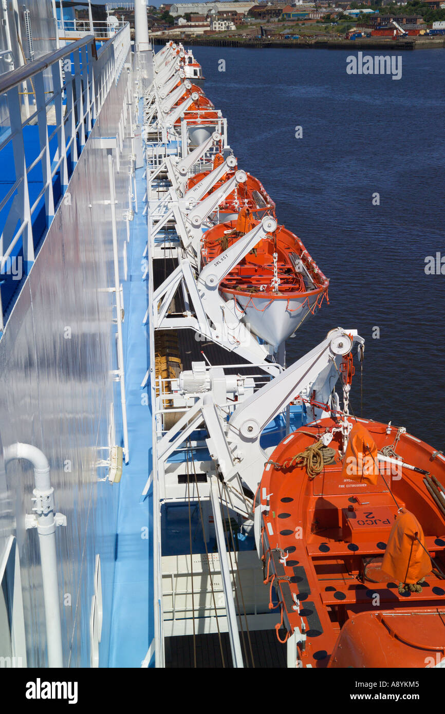 Row of Lifeboats Stock Photo - Alamy