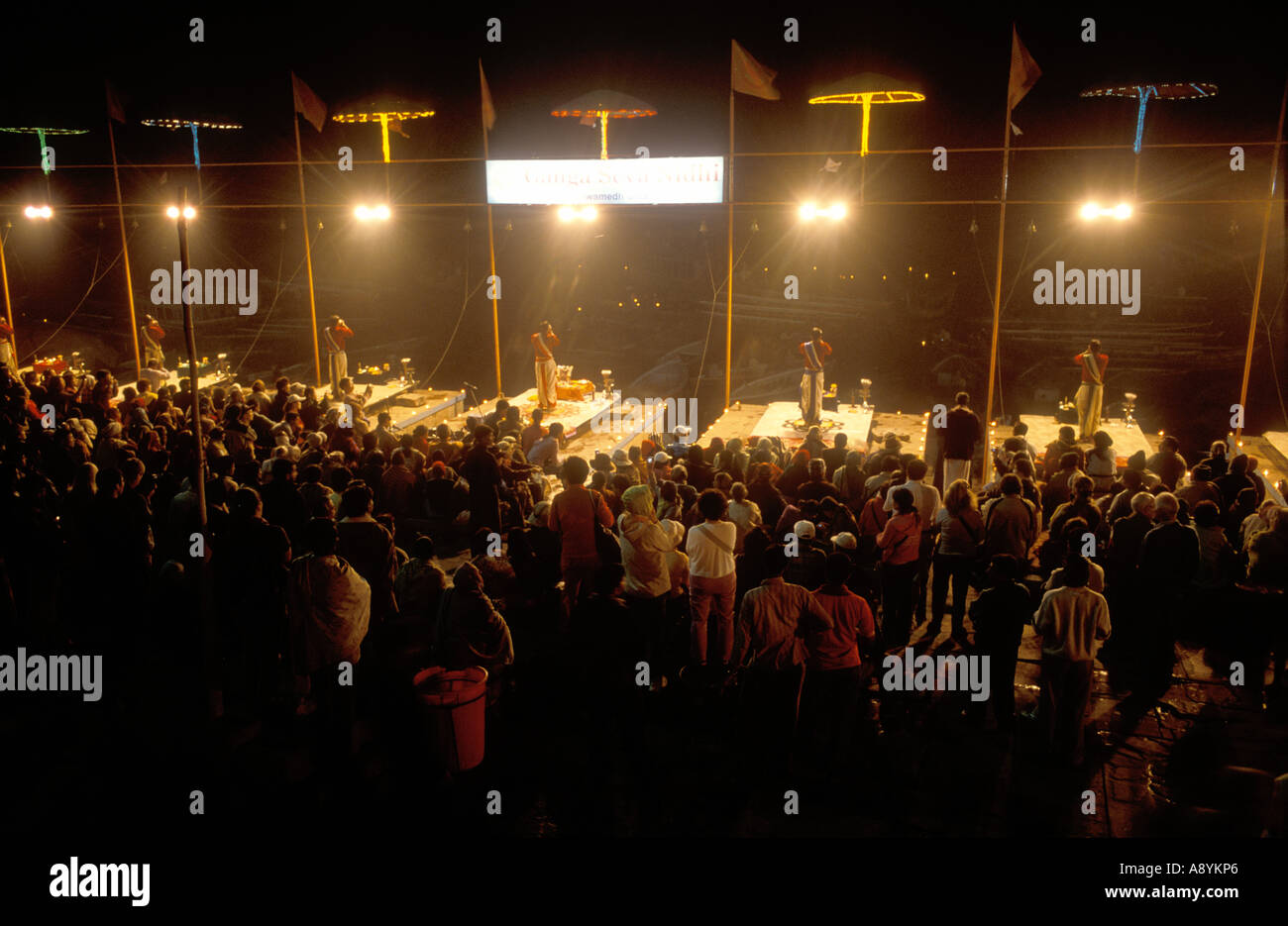An audience watch Hindu priests performing the Deepmala Ceremony at a ...