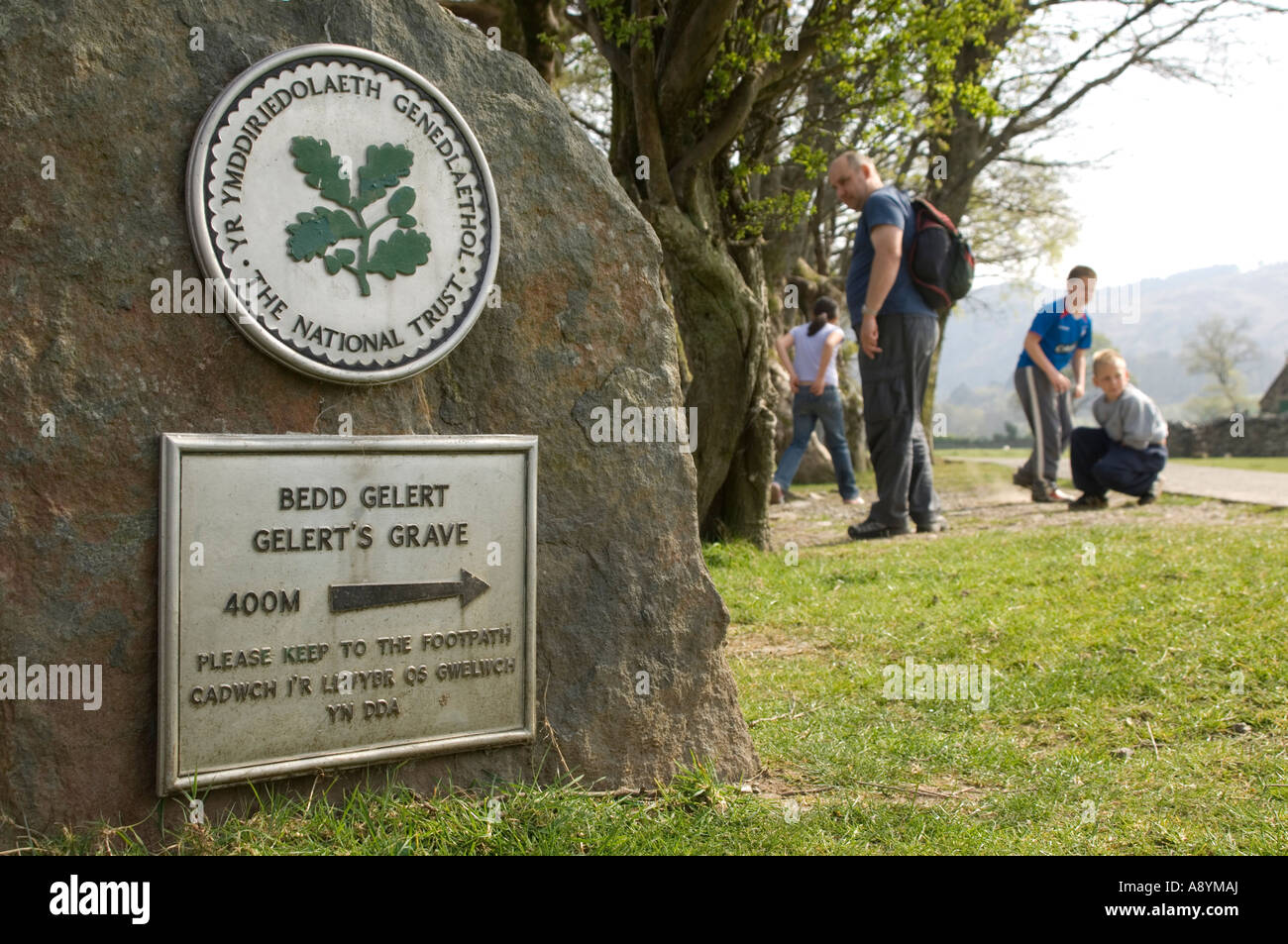 tourists by Snowdonia national park sign by footpath Beddgelert ...