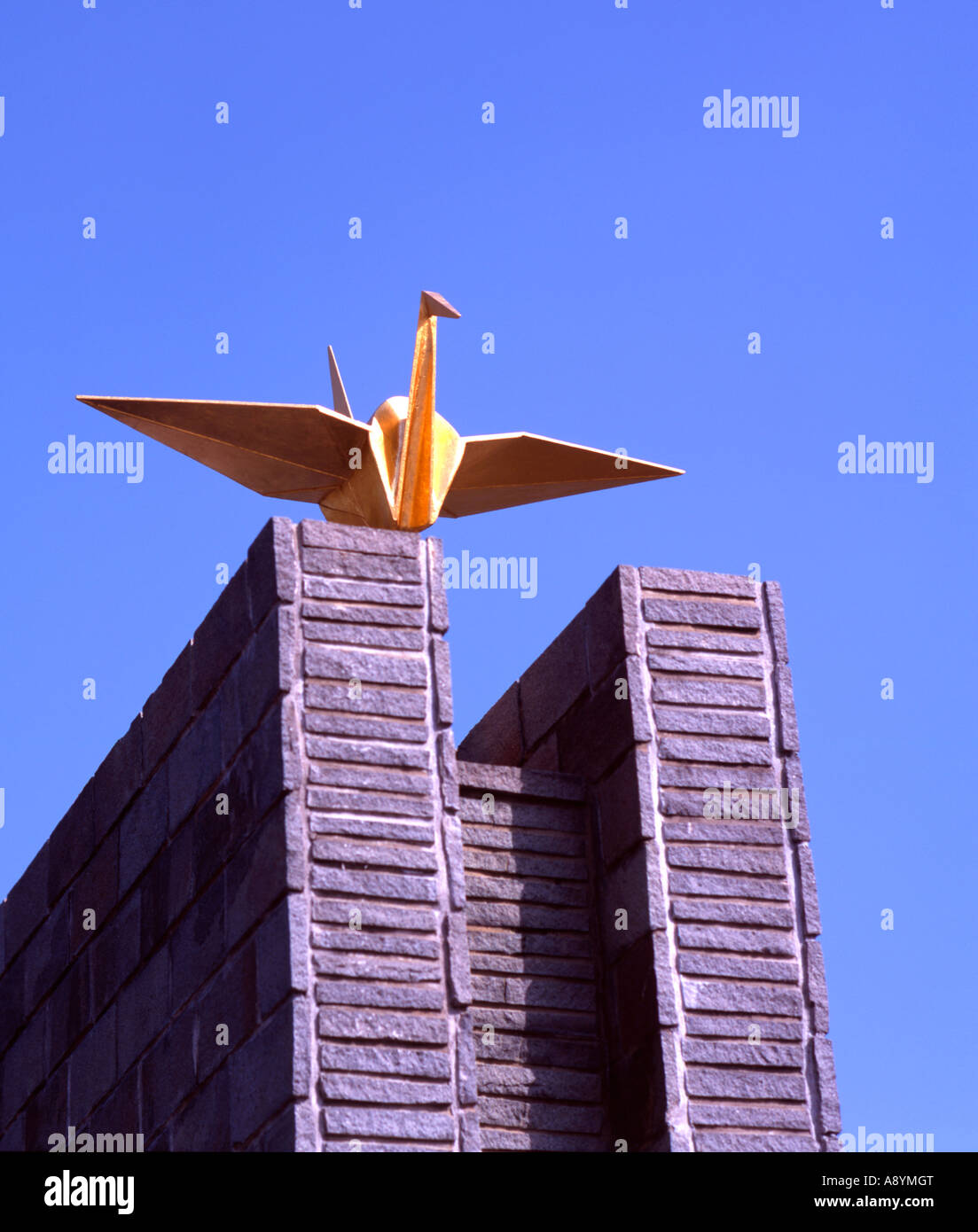 Golden Crane origami statue in Nagasaki Peace Park Stock Photo - Alamy