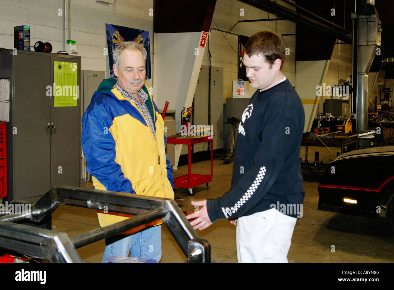 Two men in a work shop Stock Photo - Alamy